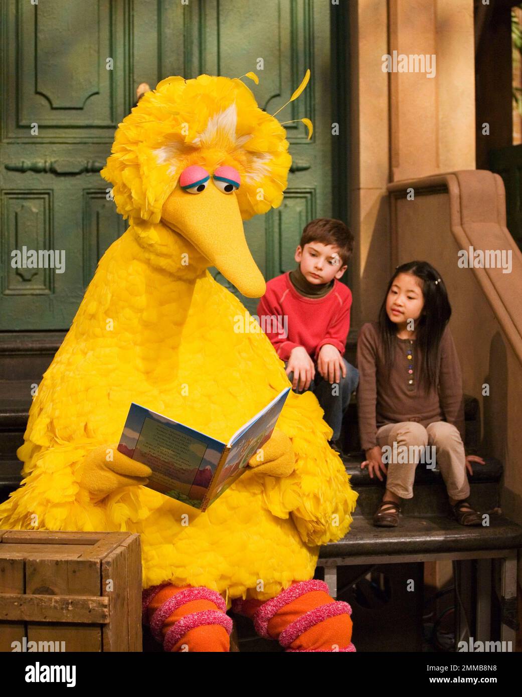 FILE- In this April 10, 2008 file photo, Big Bird reads to Connor Scott ...