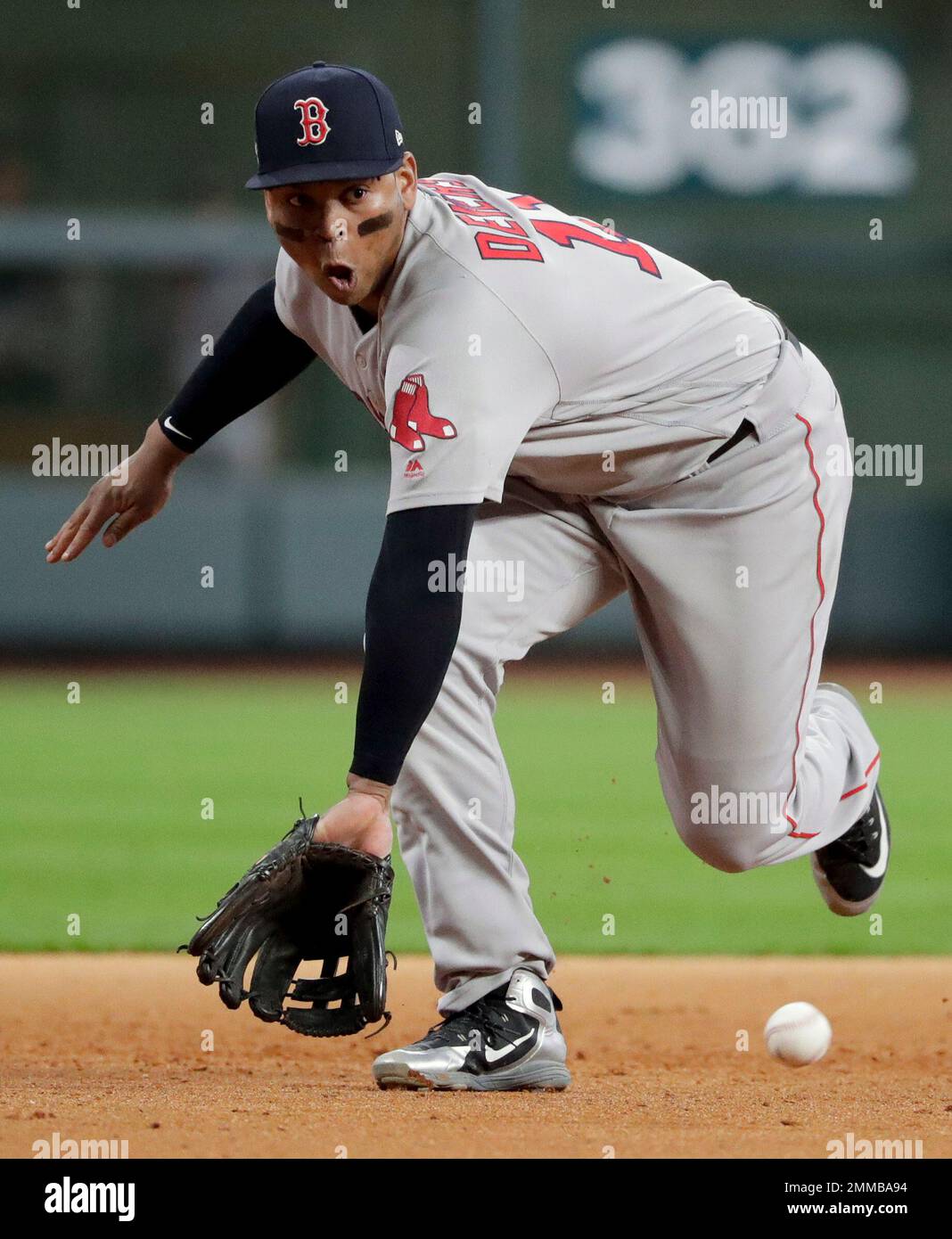 Boston Red Sox third baseman Rafael Devers fields a base hit by Houston ...