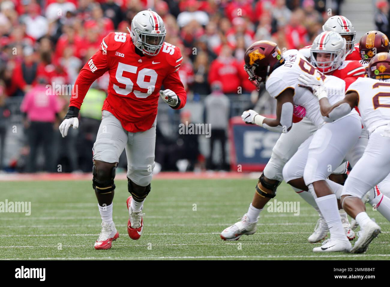 Ohio State offensive lineman Isaiah Prince plays against Minnesota ...