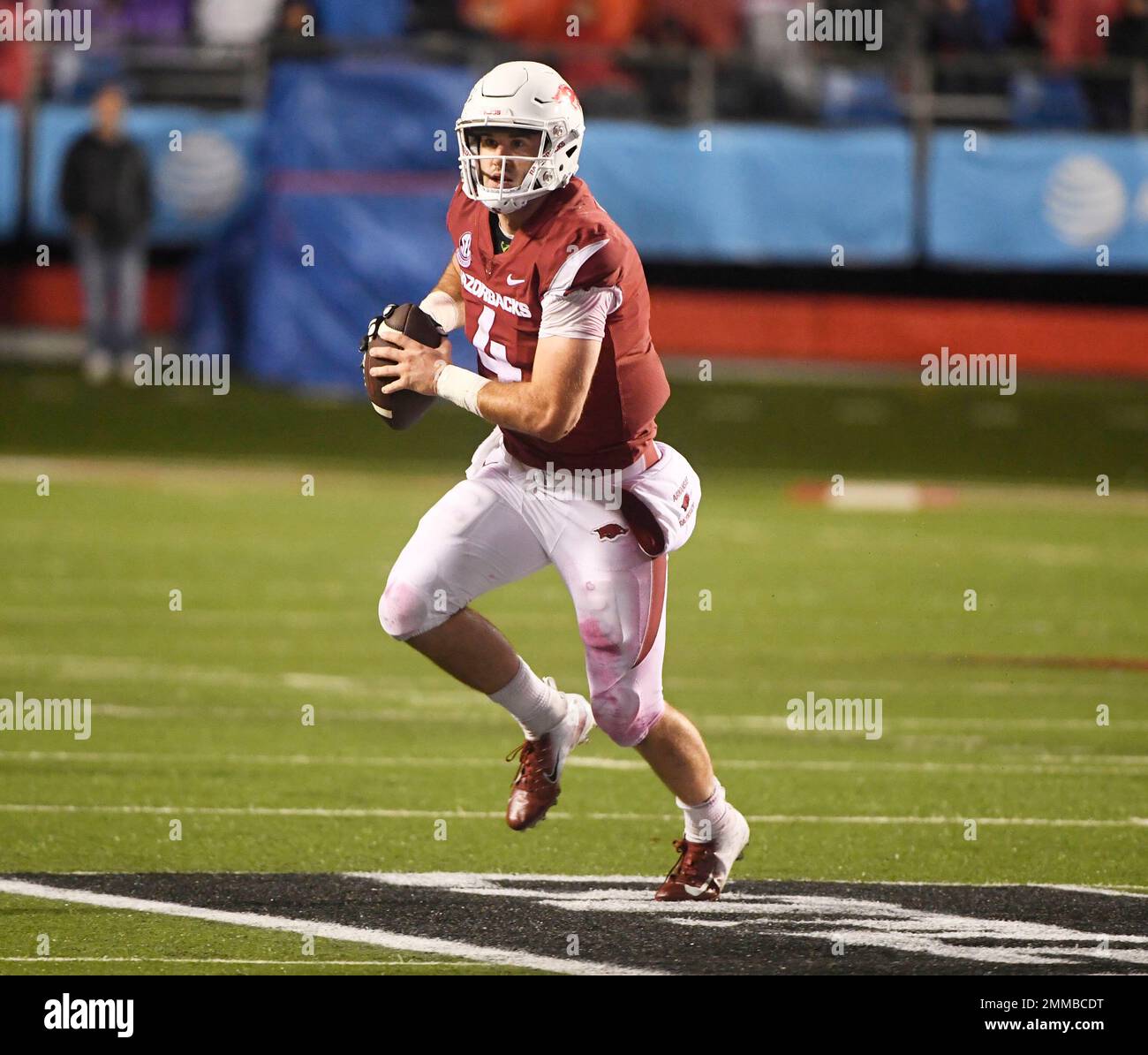 Arkansas quarterback Ty Storey runs the ball against Mississippi in the ...
