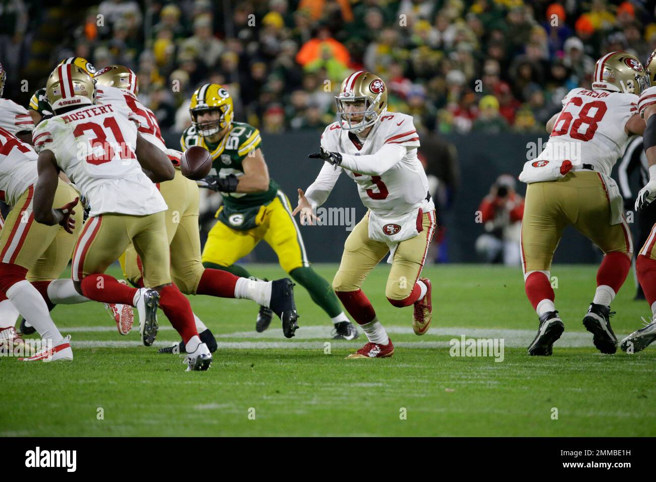 San Francisco 49ers quarterback C.J. Beathard (3) pitches to running ...