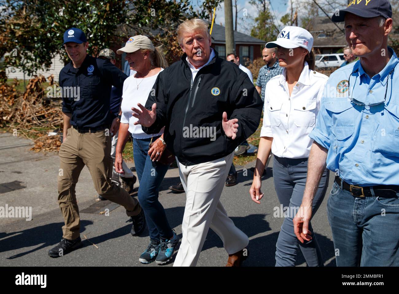 President Donald Trump and first lady Melania Trump tour a neighborhood ...