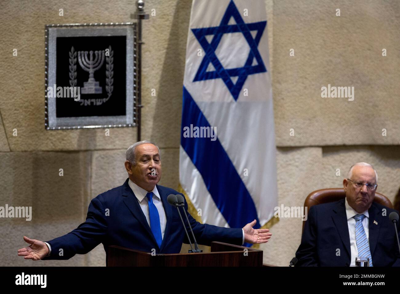 Israeli Prime Minister Benjamin Netanyahu, left, speaks as Israel's ...