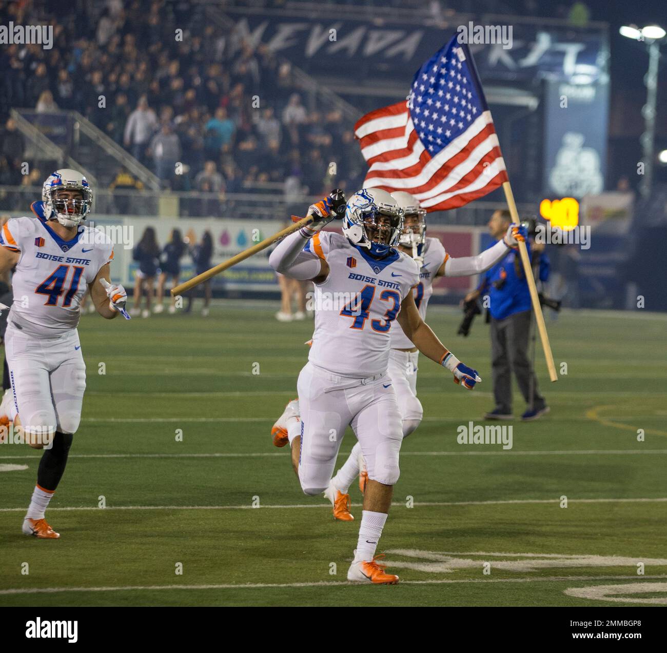 Boise State linebacker Joe Provenzano (43) leads his team onto the ...