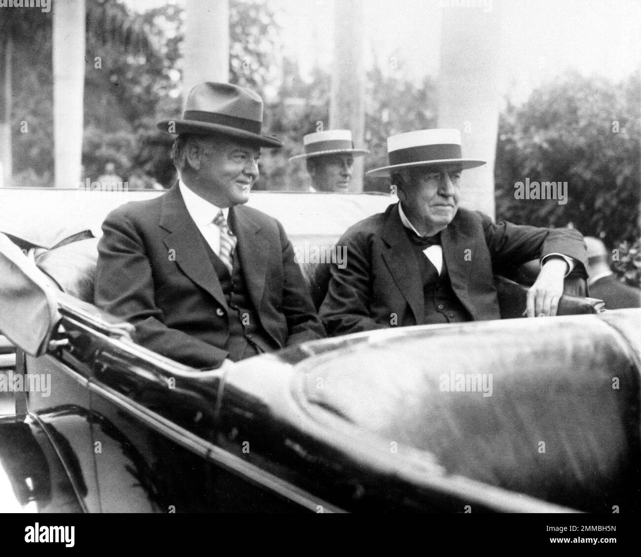 Thomas Alva Edison, right, and President-elect Herbert Hoover ride in a ...