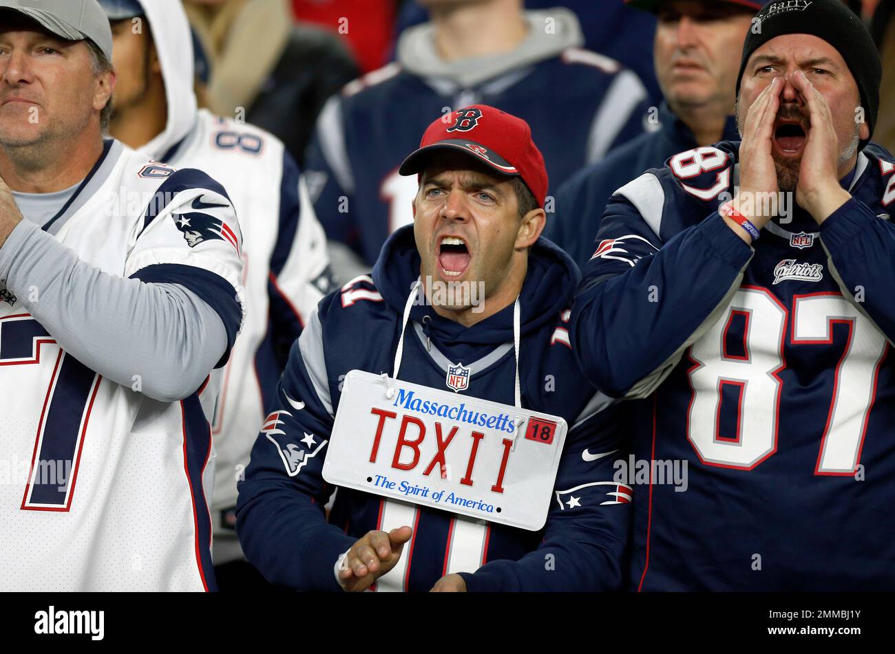 New England Patriots fans cheer during the second half of an NFL ...