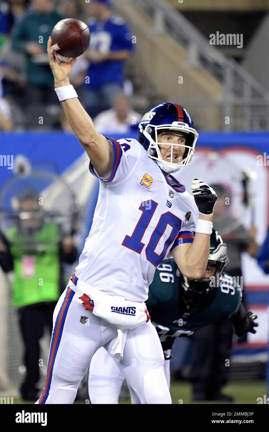 New York Giants quarterback Eli Manning (10) passes as Philadelphia ...