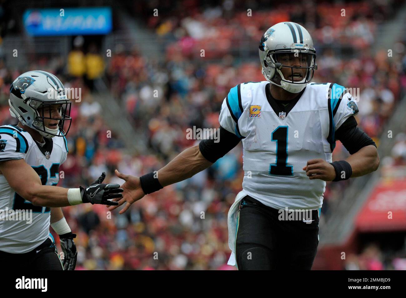 Carolina Panthers quarterback Cam Newton (right) and running back ...