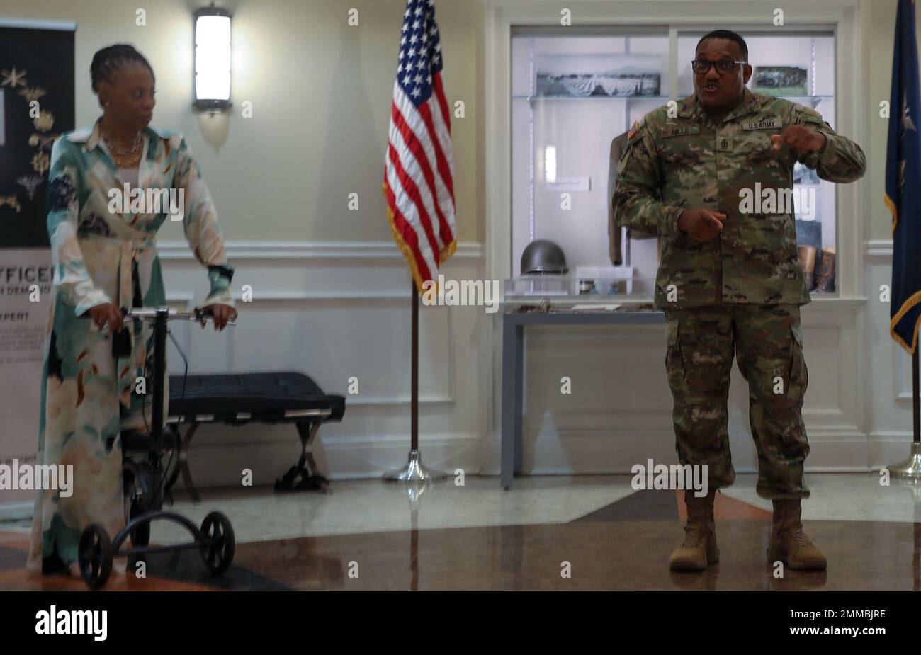 U.S. Army 1st Sgt. Anthony Mills, a food services force manager, talks ...