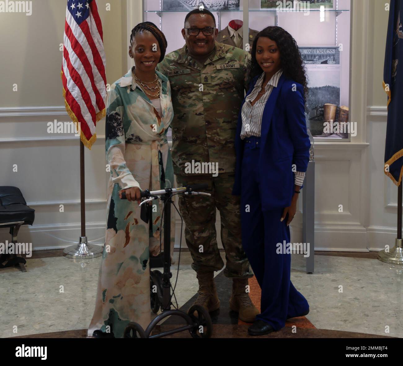 U.S. Army 1st Sgt. Anthony Mills, a food services force manager, poses ...