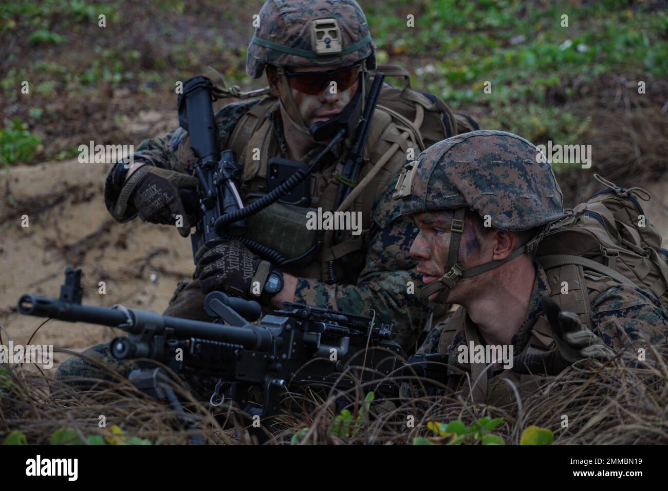 U.S. Marines provide security during an amphibious landing as part of ...