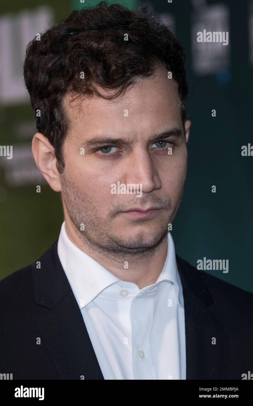 Michael Moshonov poses for photographers upon arrival at the premiere ...
