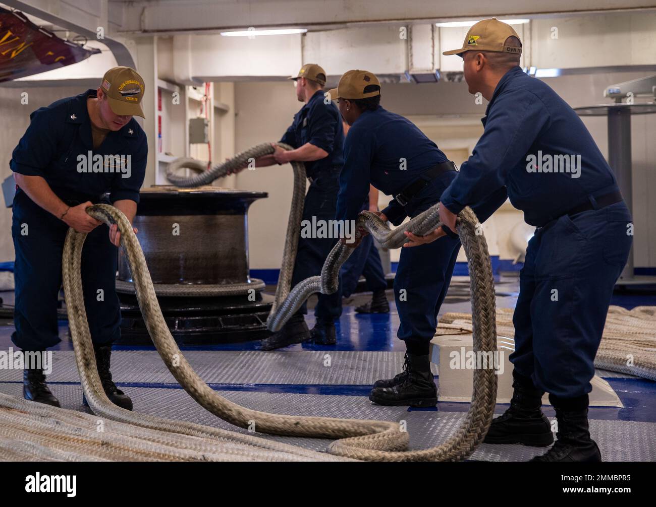 Sailors assigned to USS Gerald R. Ford’s (CVN 78) deck department heave ...
