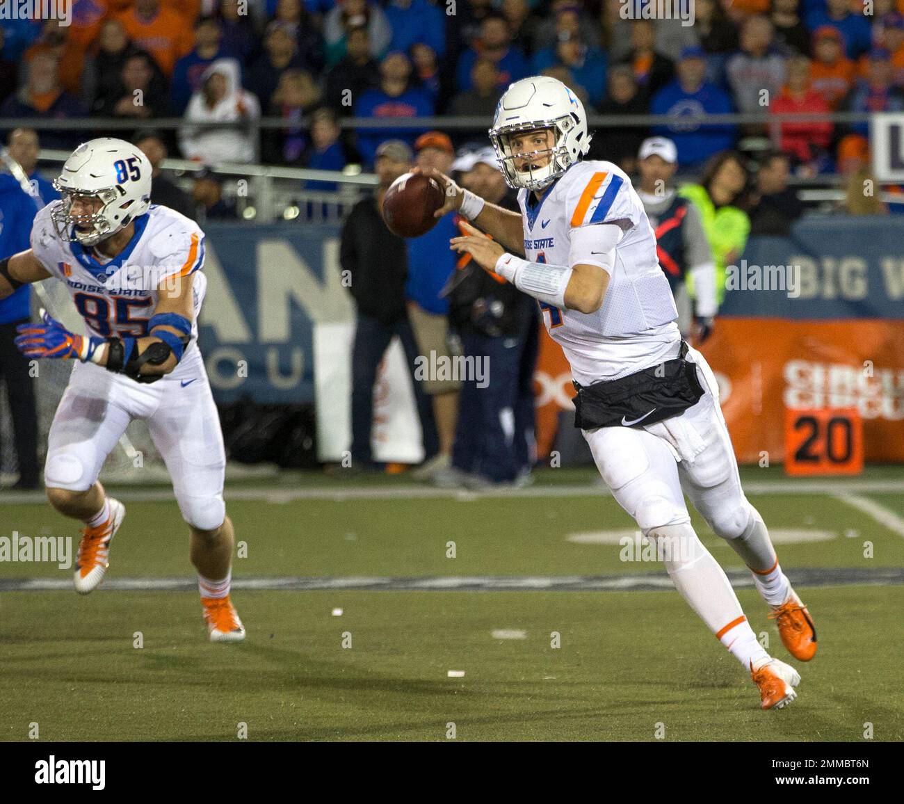 Boise State quarterback Brett Rypien (4) rolls out against Nevada in ...