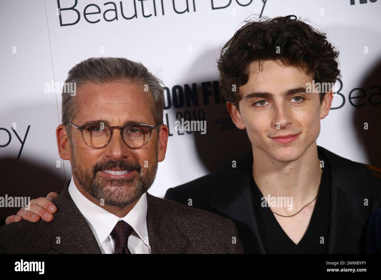 Actors Timothee Chalamet, right and Steve Carell pose for photographers upon arrival at the ...