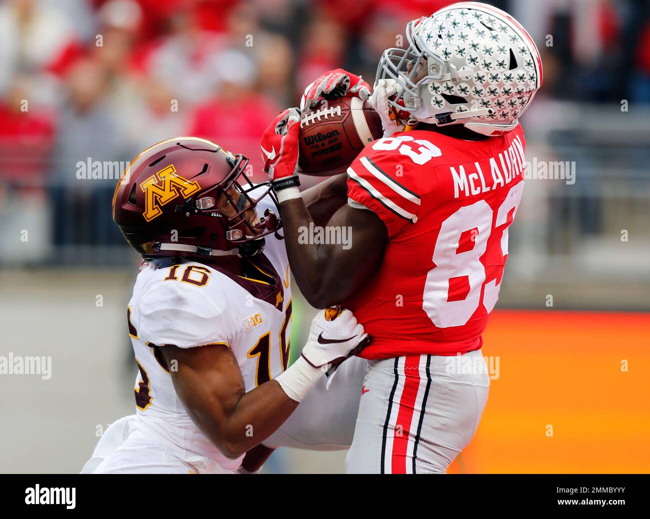Ohio State receiver Terry McLaurin, right, catches a touchdown pass ...