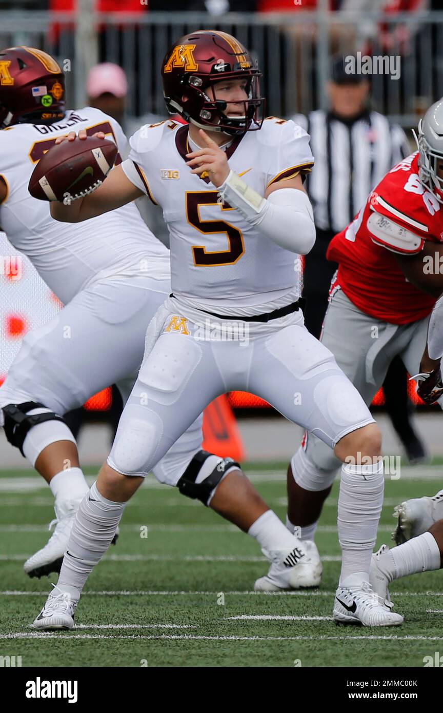 Minnesota quarterback Zack Annexstad drops back top pass against Ohio ...