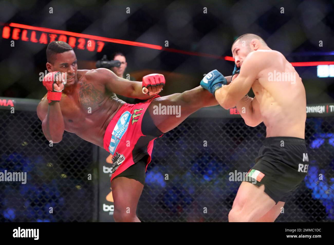 Lorenz Larkin, left, lands a kick on Ion Pascu during a mixed martial ...