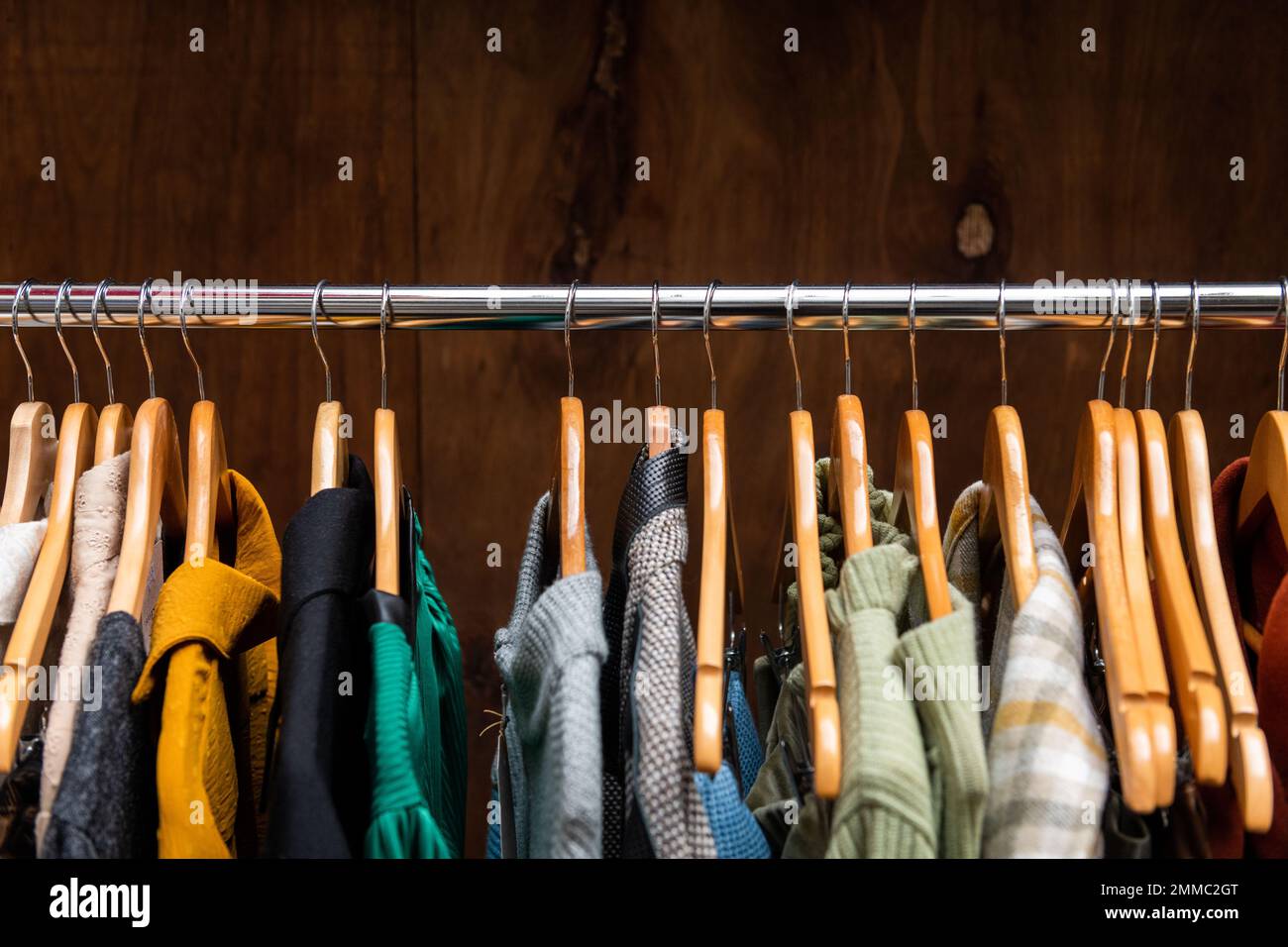 Clothes on hangers hi-res stock photography and images - Alamy