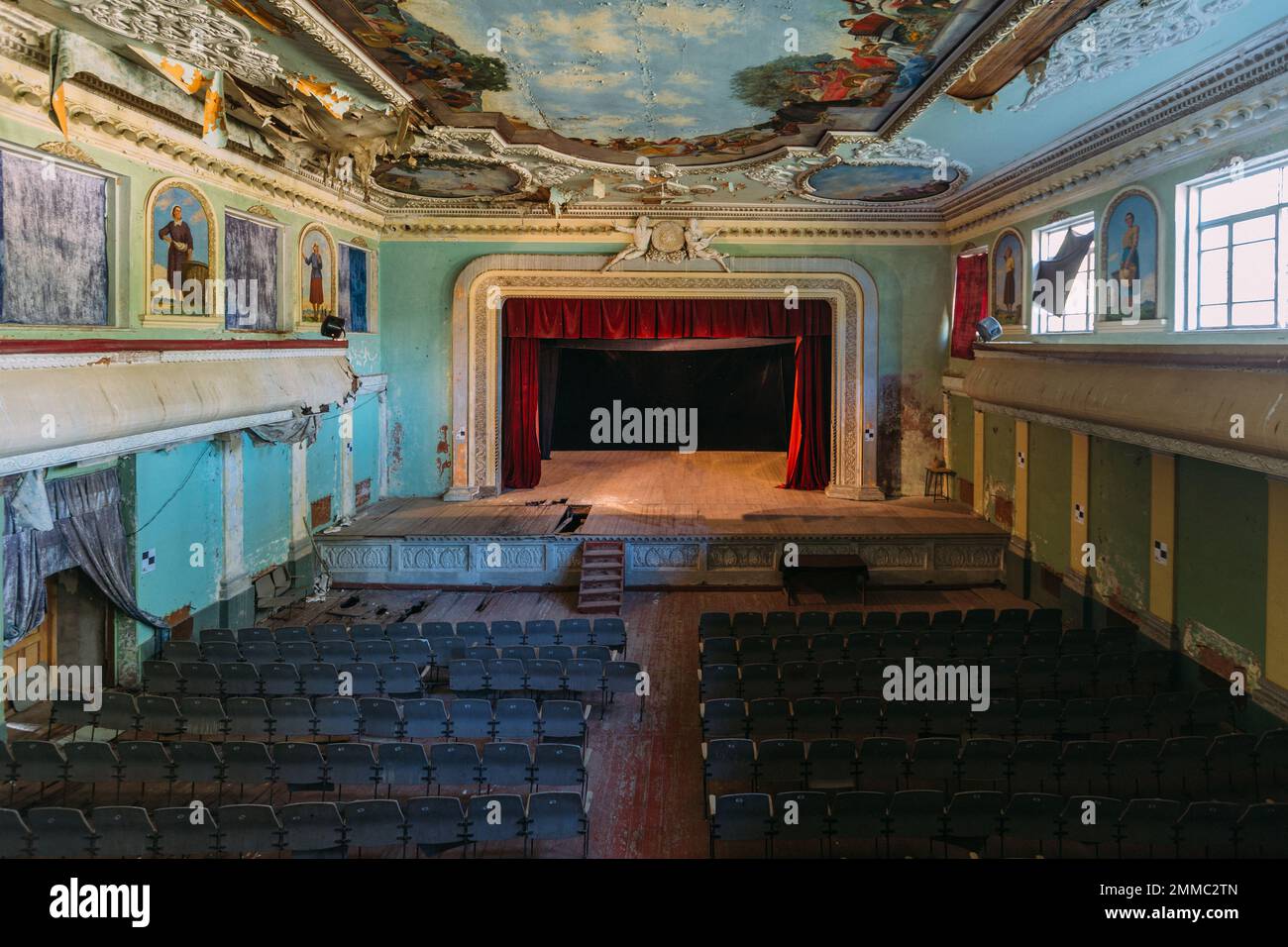 Old abandoned ruined stage theater with paintings Stock Photo - Alamy