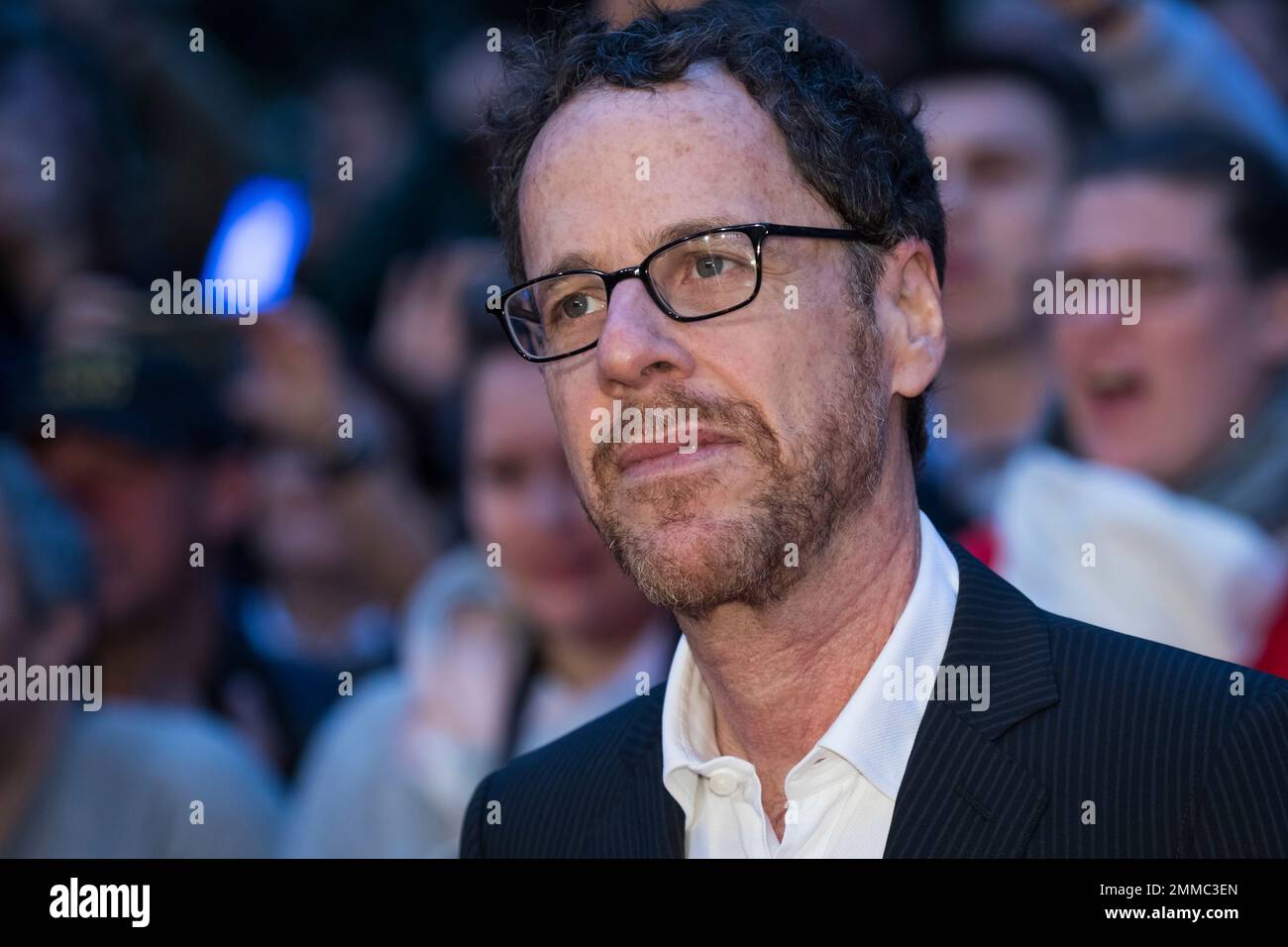 Director Etan Cohen poses for photographers upon arrival at the ...