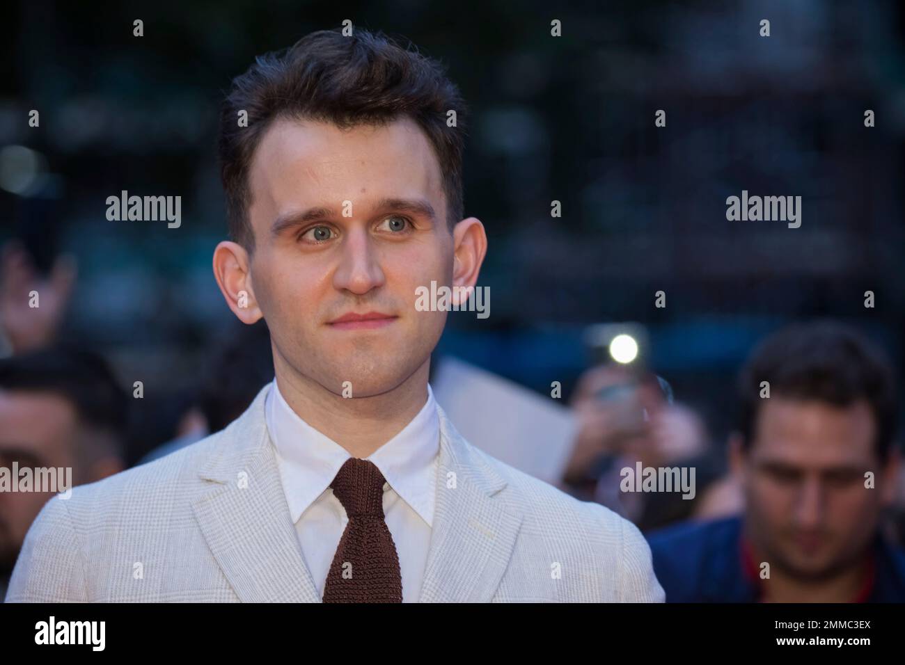 Actor Harry Melling poses for photographers upon arrival at the ...