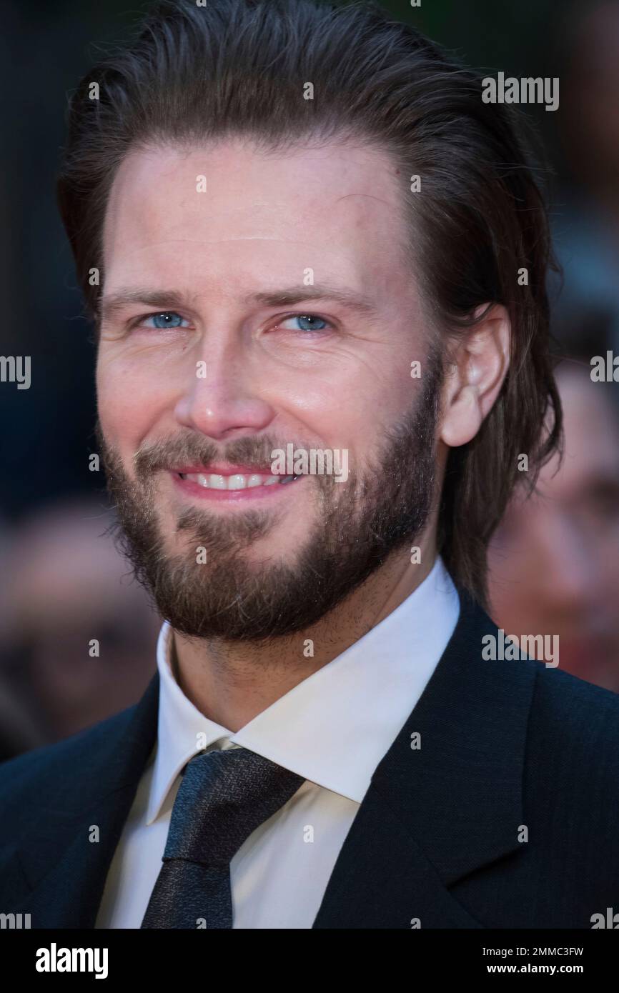 Bill Heck poses for photographers upon arrival at the premiere of the ...