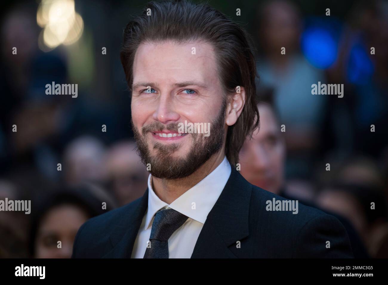 Bill Heck poses for photographers upon arrival at the premiere of the ...