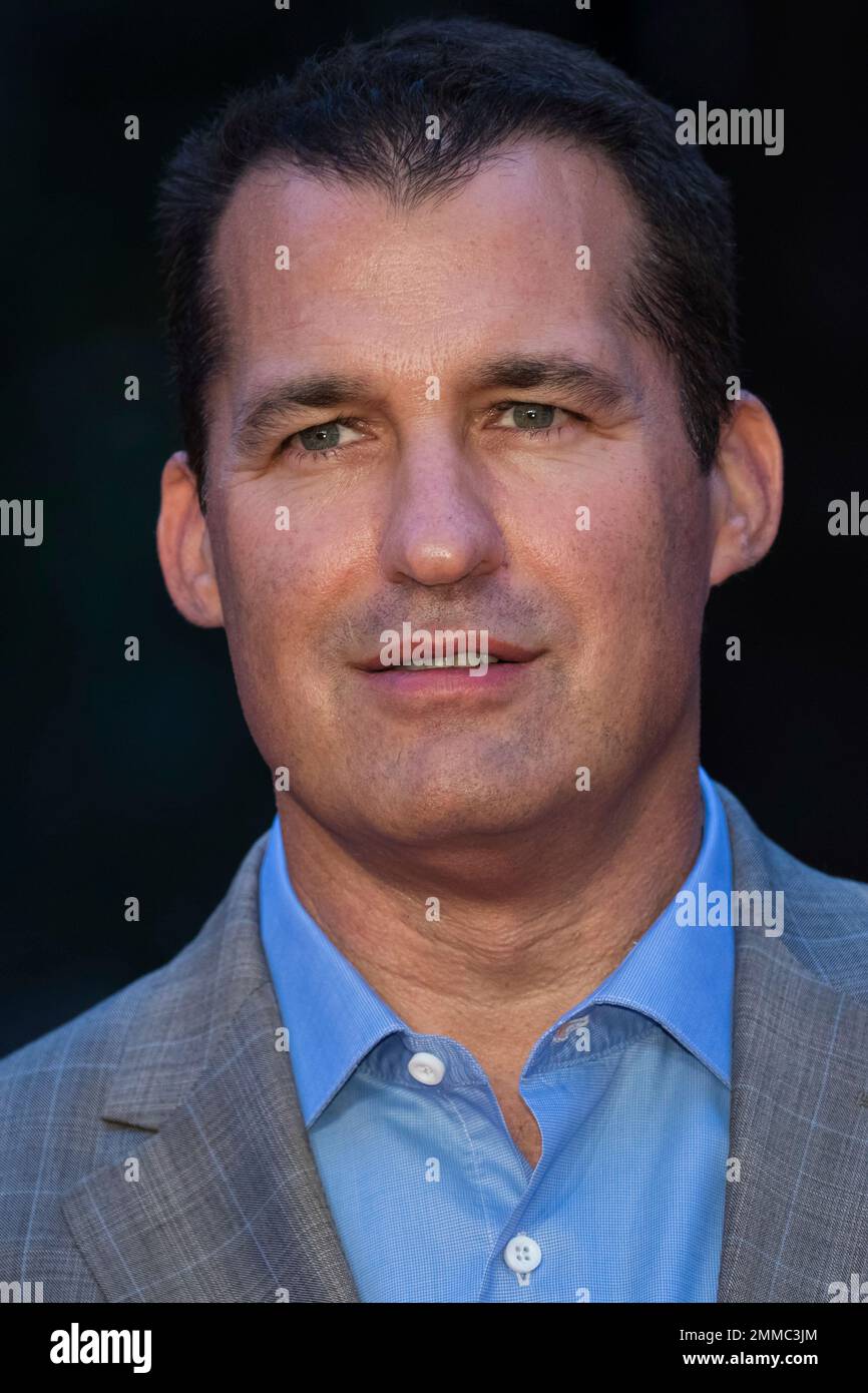 Producer Scott Stuber poses for photographers upon arrival at the ...