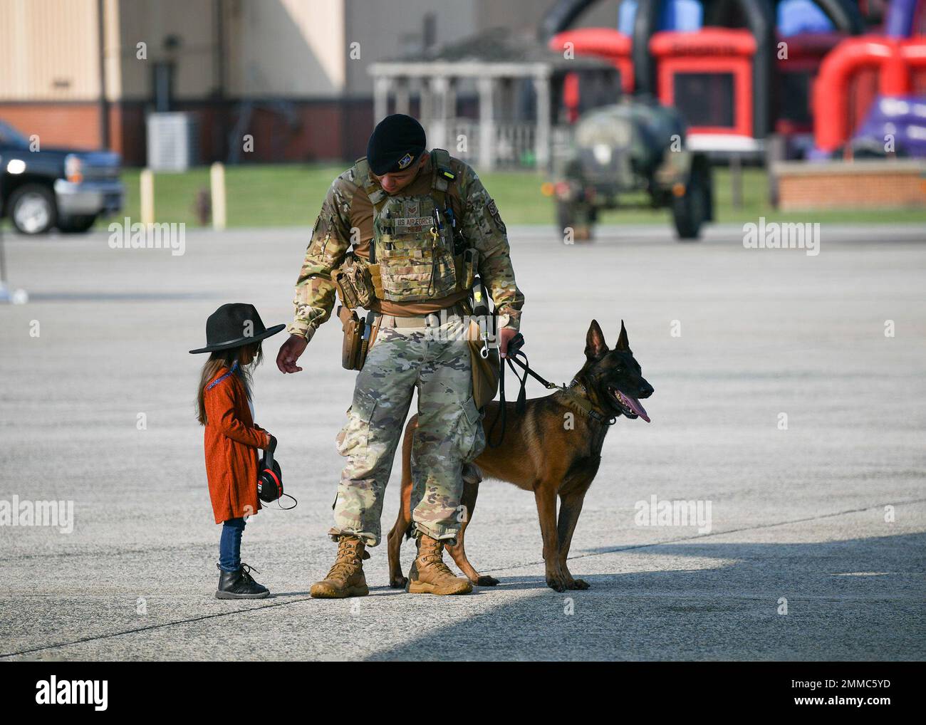 Guests gaze upon the C-17 Globemaster III as it sits on display at the ...
