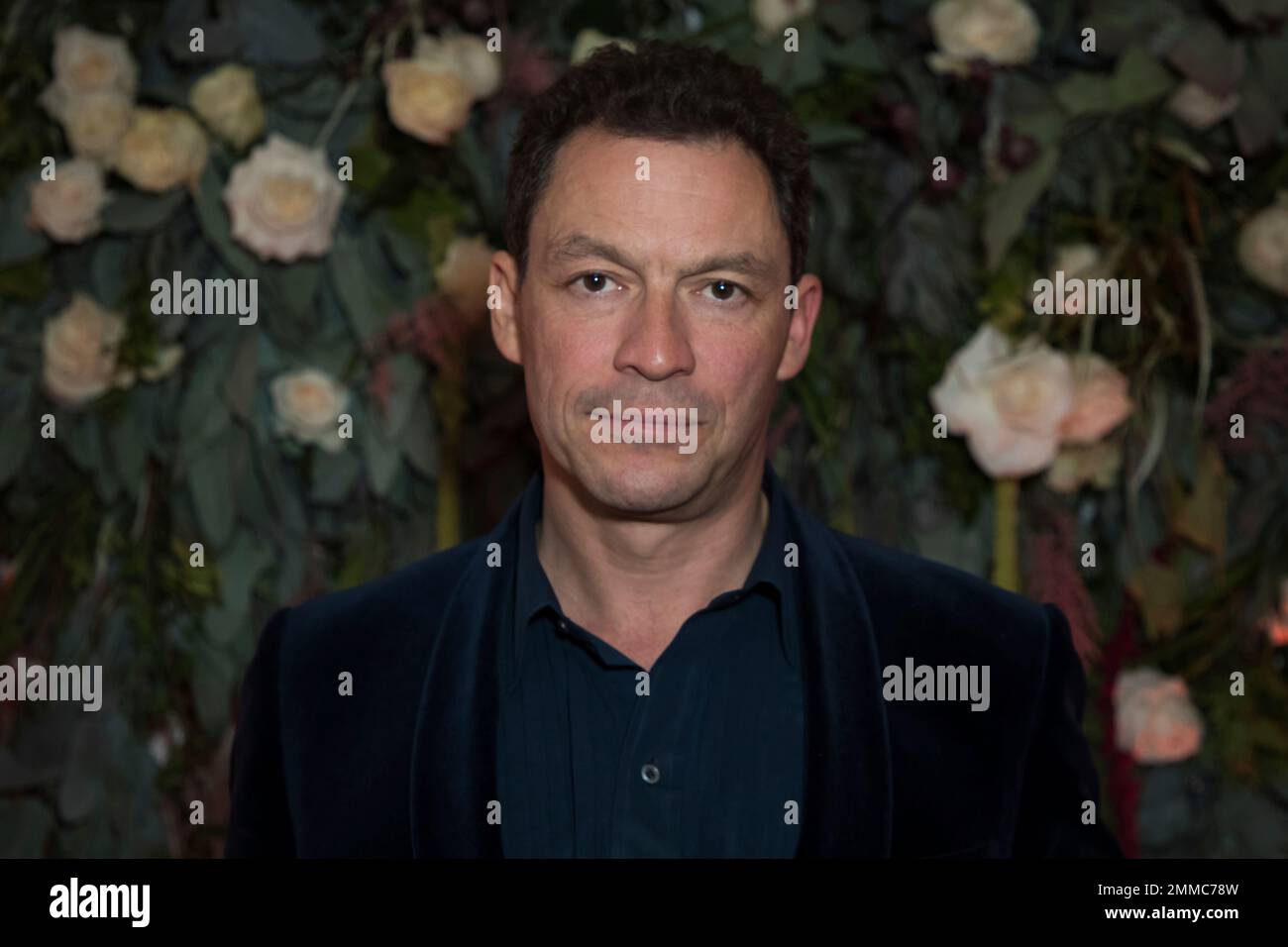 Actor Dominic West poses for photographers upon arrival at the party ...