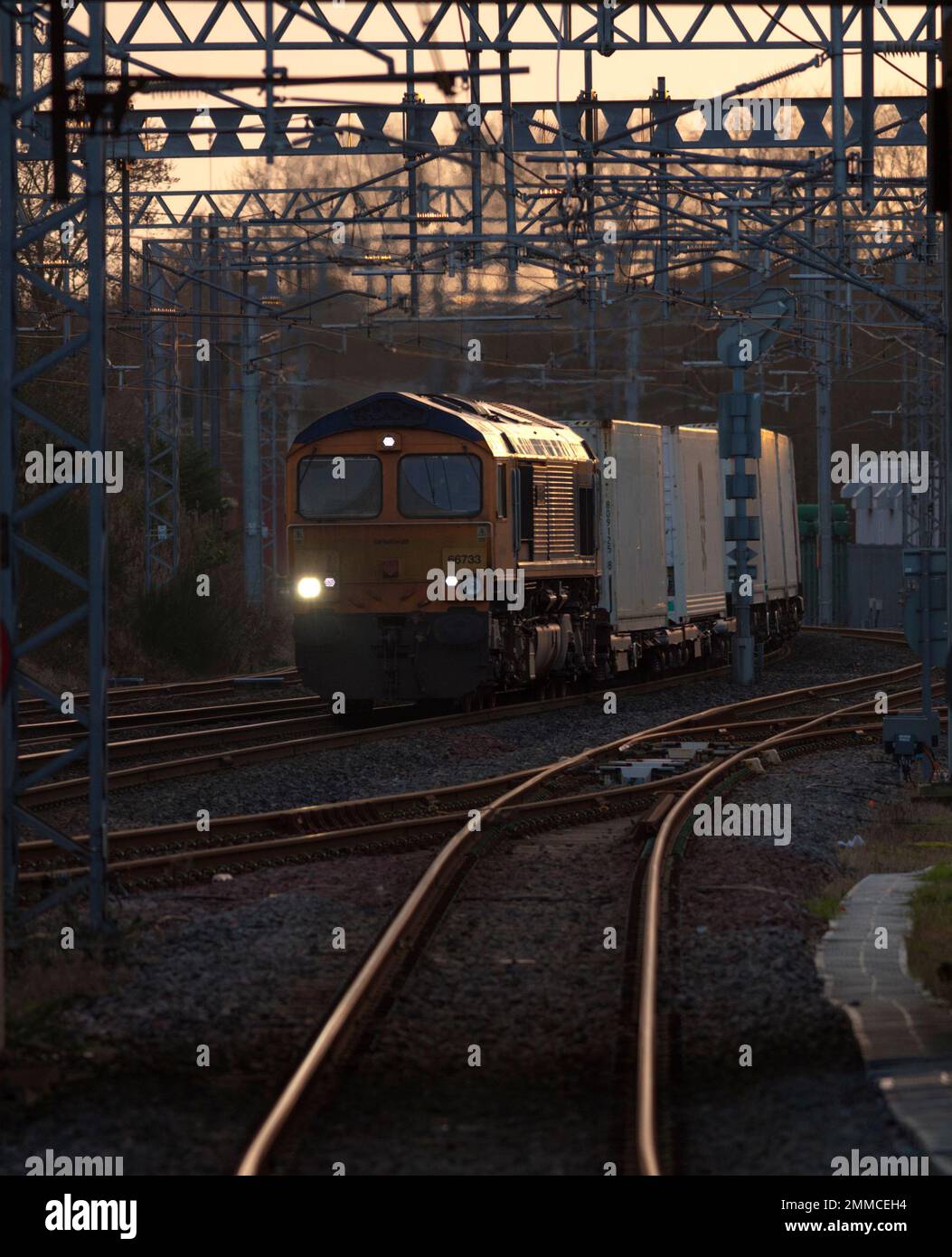 GB Railfreight class 66 diesel locomotive 66733 hauling an intermodal ...