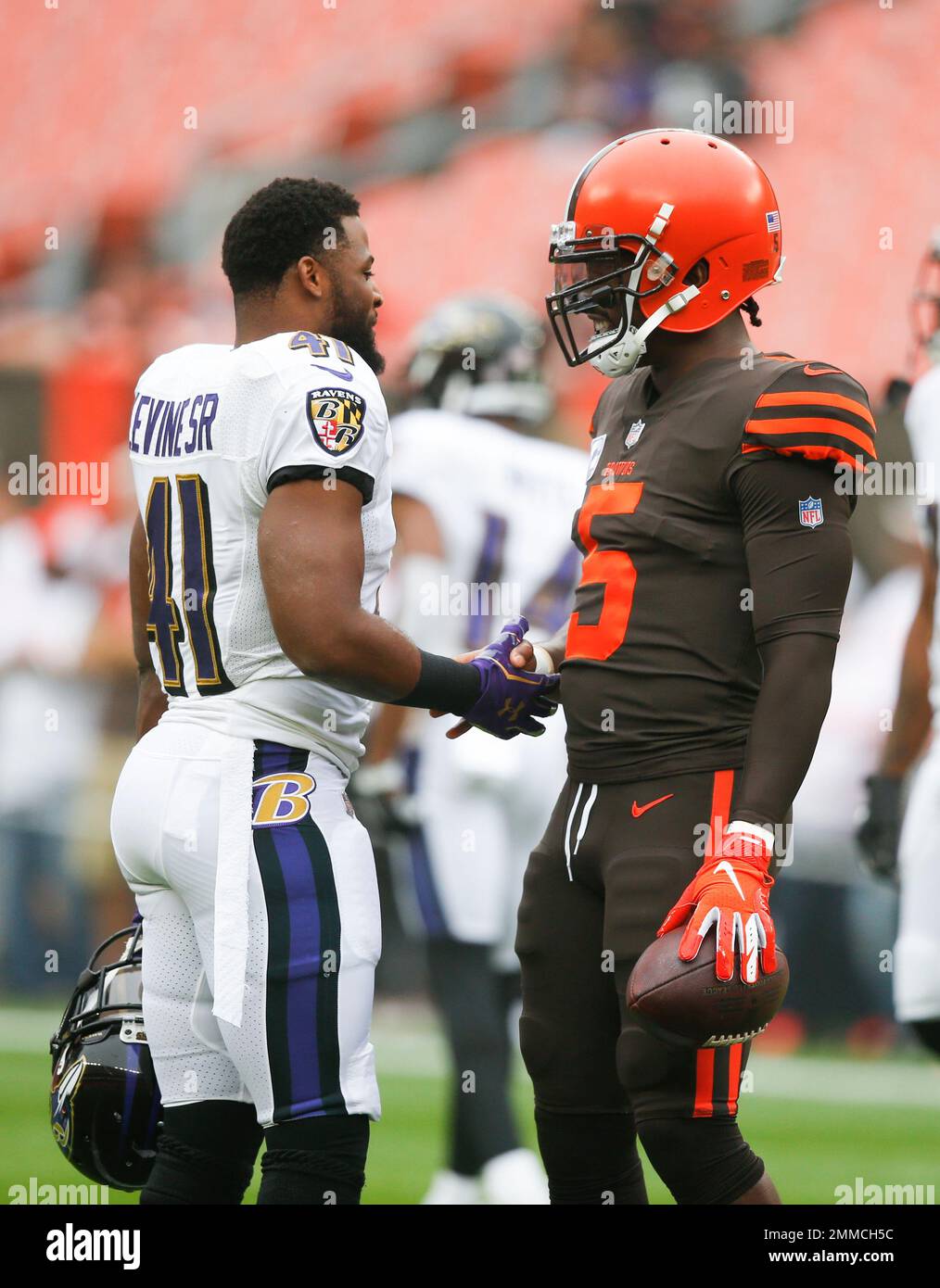Cleveland Browns quarterback Tyrod Taylor (5) talks with Baltimore ...