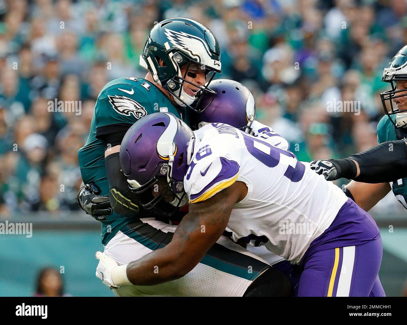 Philadelphia Eagles quarterback Carson Wentz is hit by Minnesota ...