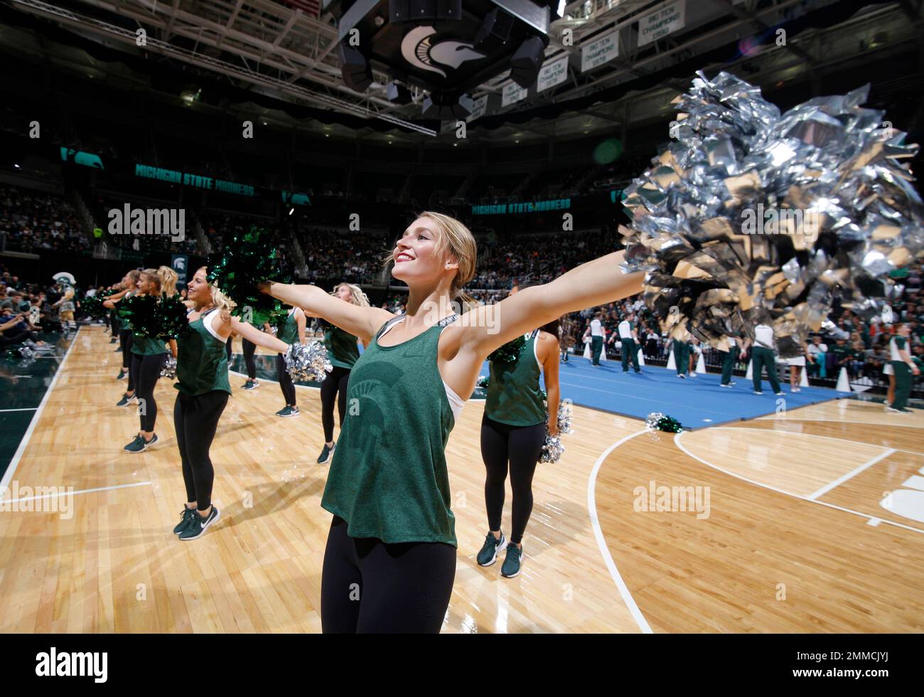 Michigan State's dance team performs before an NCAA college basketball ...