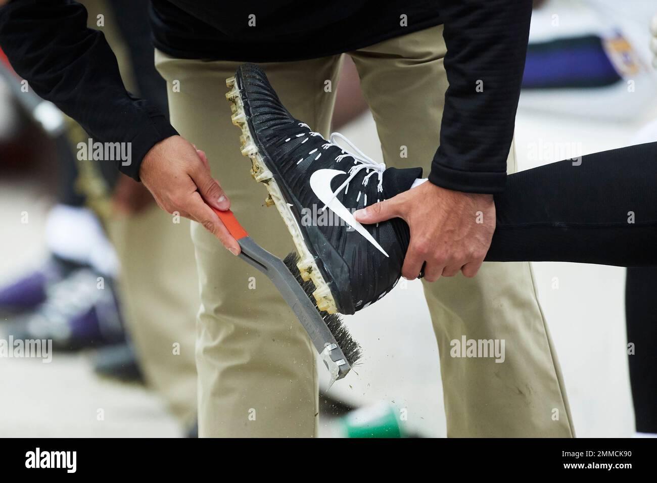 Cleat cleaned on the sideline during an NFL football game at First ...