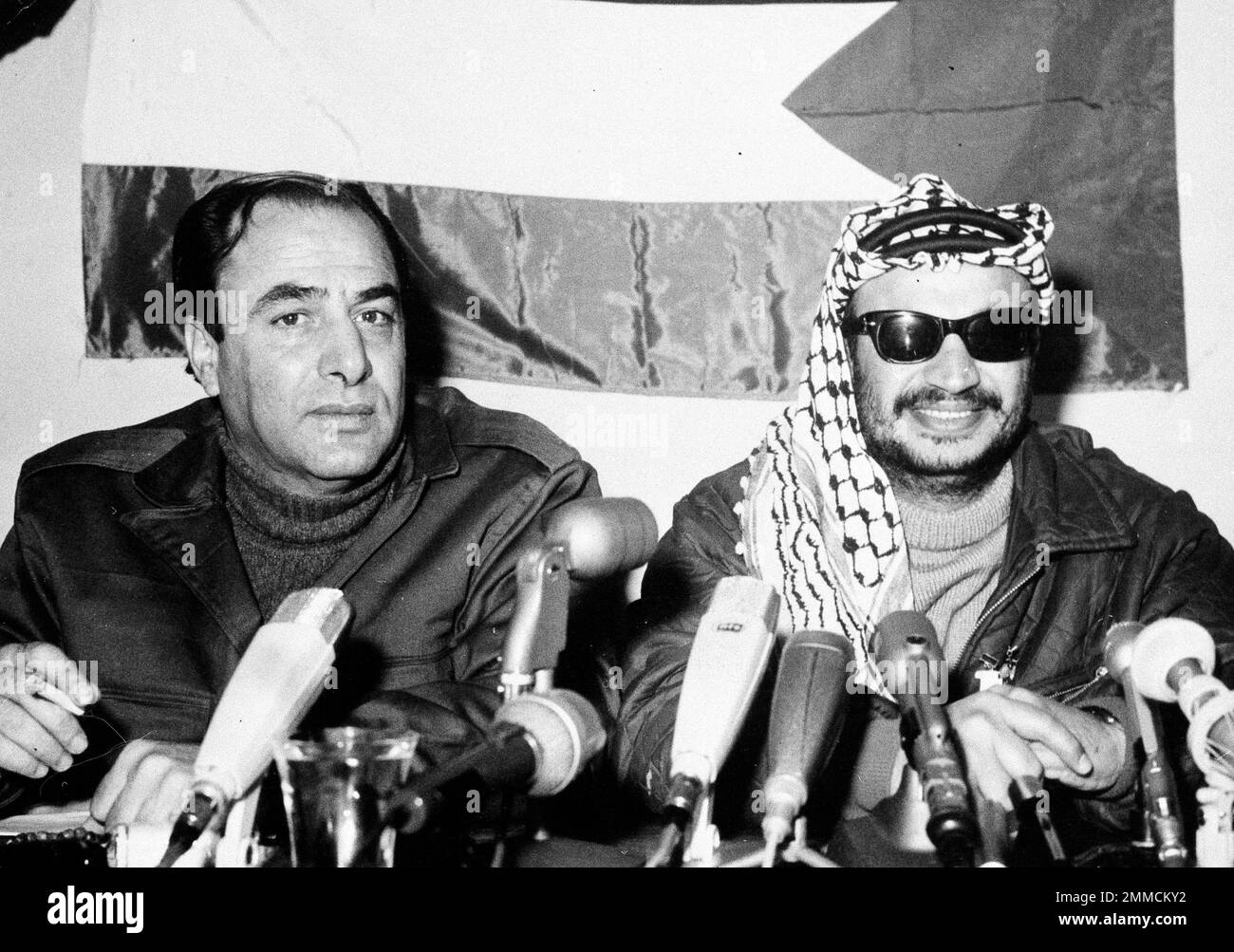 Leader of the Palestine Liberation Organization Yasser Arafat, right ...