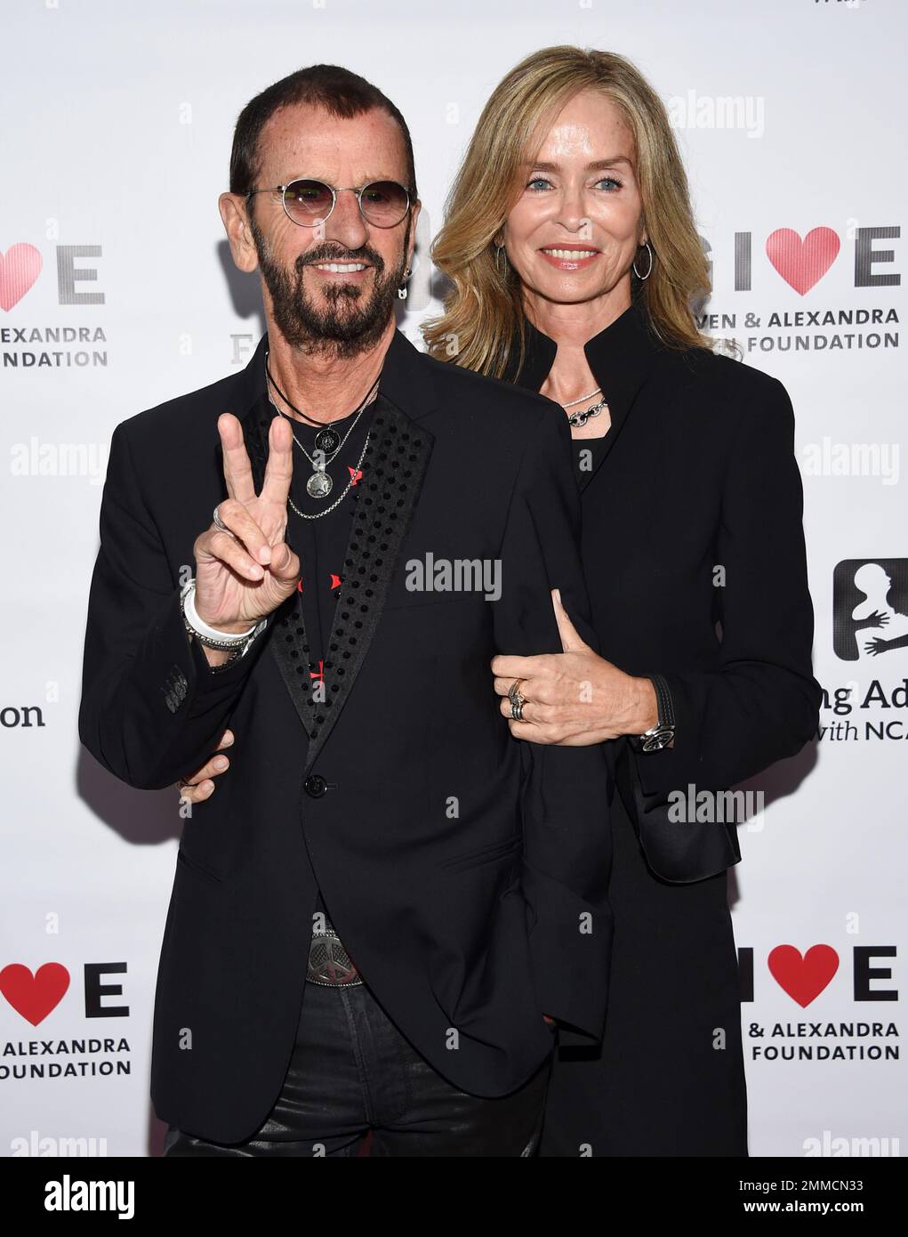 Sir Ringo Starr, left, his wife Barbara Bach pose together at the ...