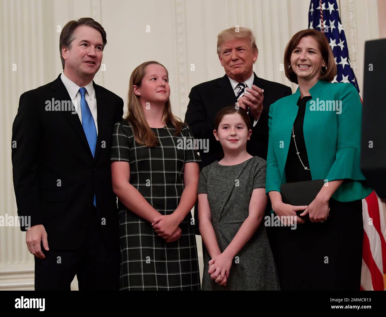 President Donald Trump and the audience, applaud Supreme Court Justice ...