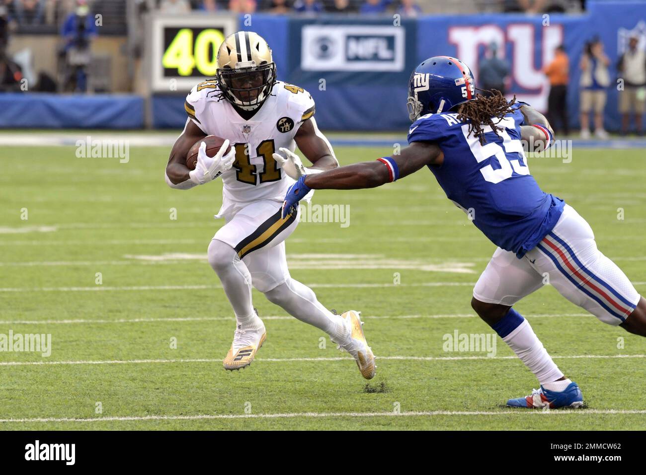 New Orleans Saints running back Alvin Kamara (41) attempts to get by ...