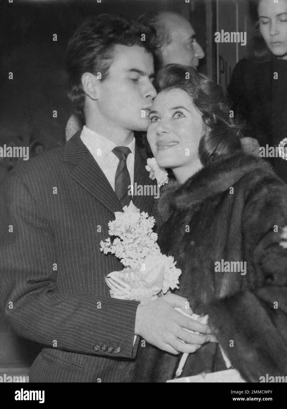 German screen actor Horst Buchholz kisses his bride, Myriam Bru, a ...