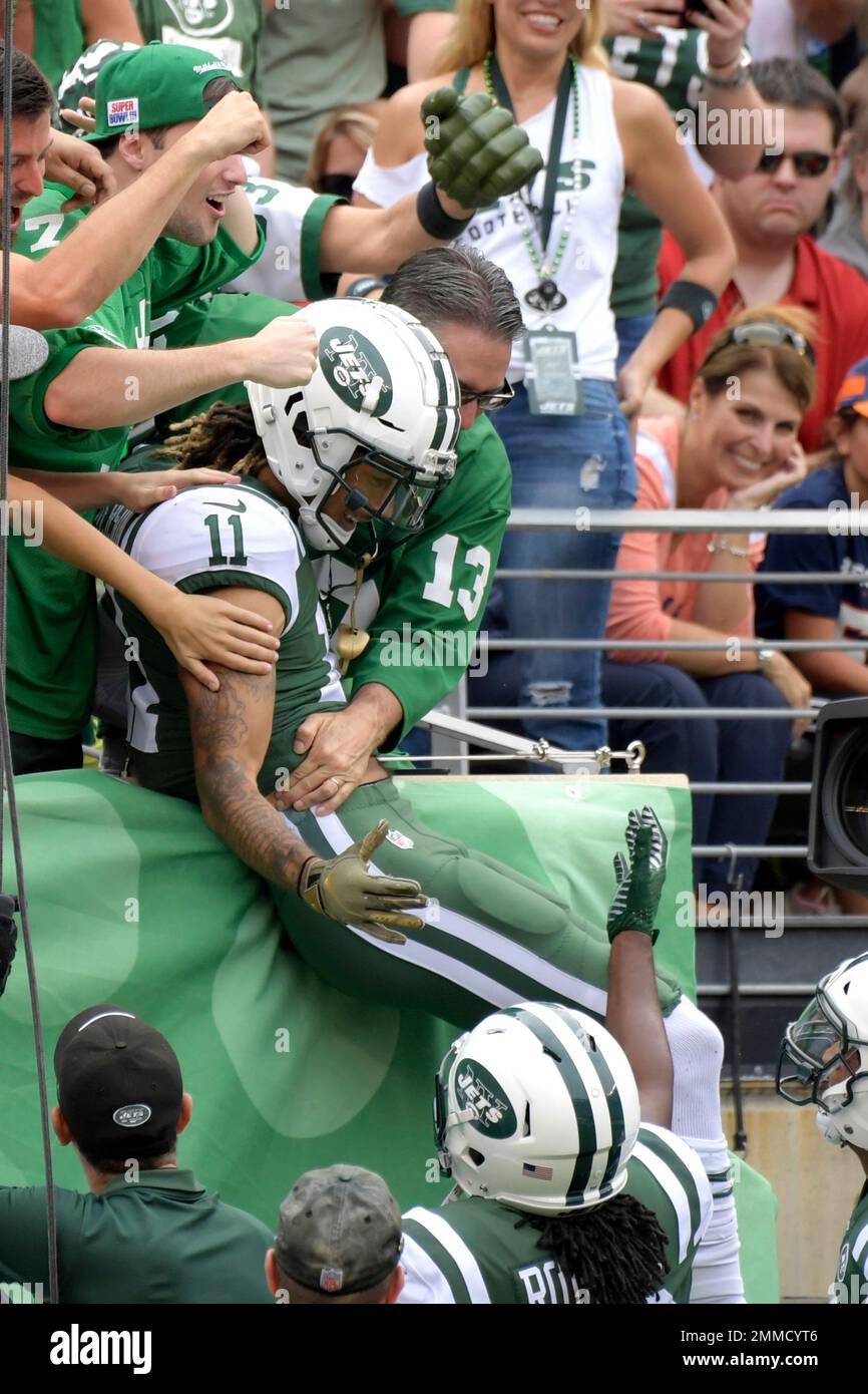 New York Jets' Robby Anderson (11) celebrates with fans after scoring a ...