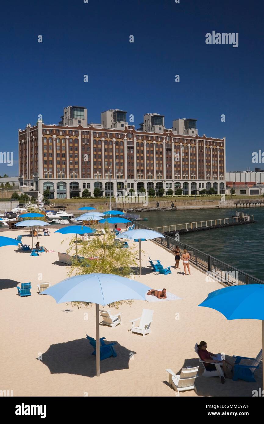 Clock tower beach facing the marina in the Old Port of Montreal in ...