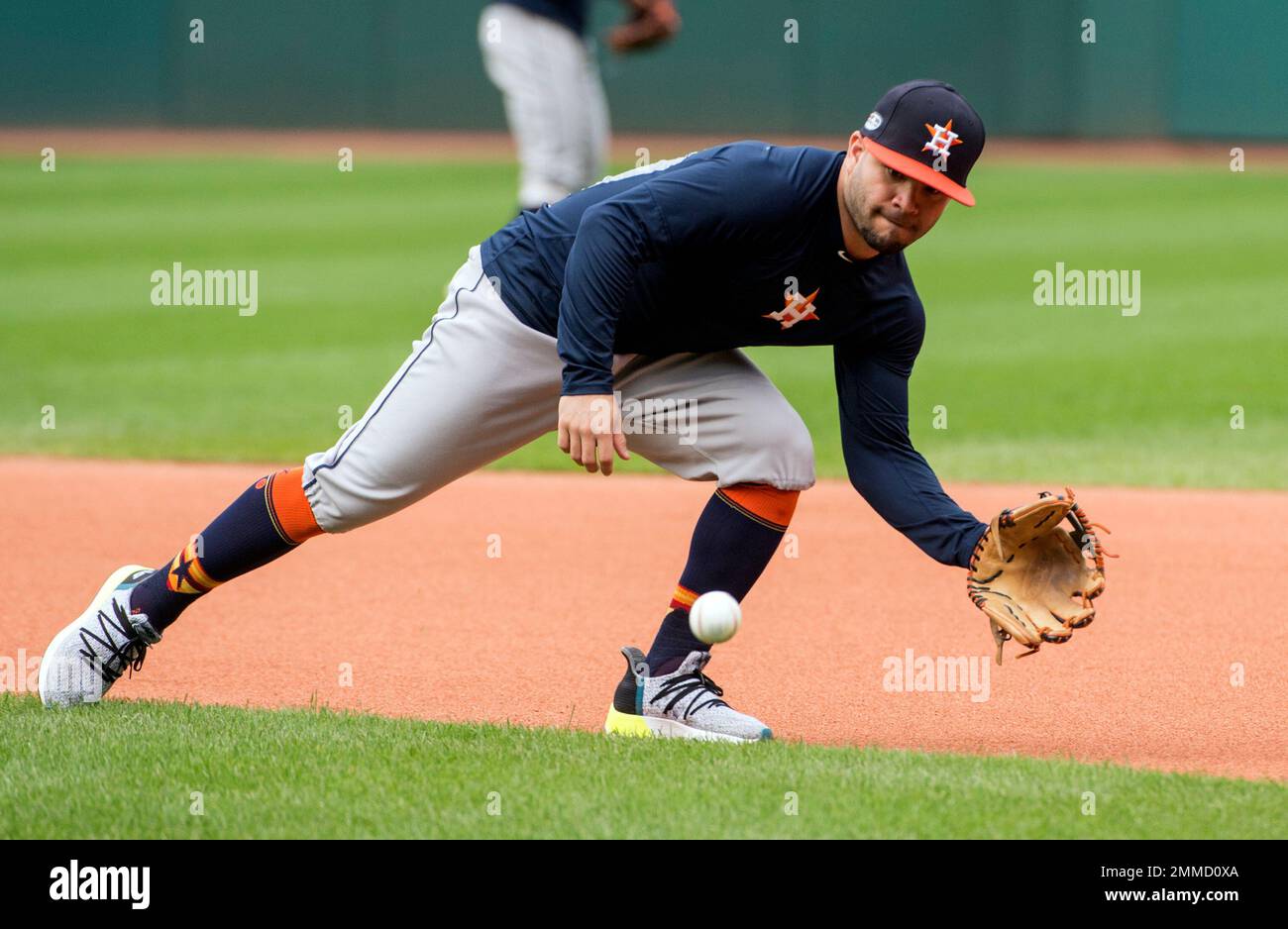 Houston Astros' Jose Altuve fields a ground ball during a workout in ...