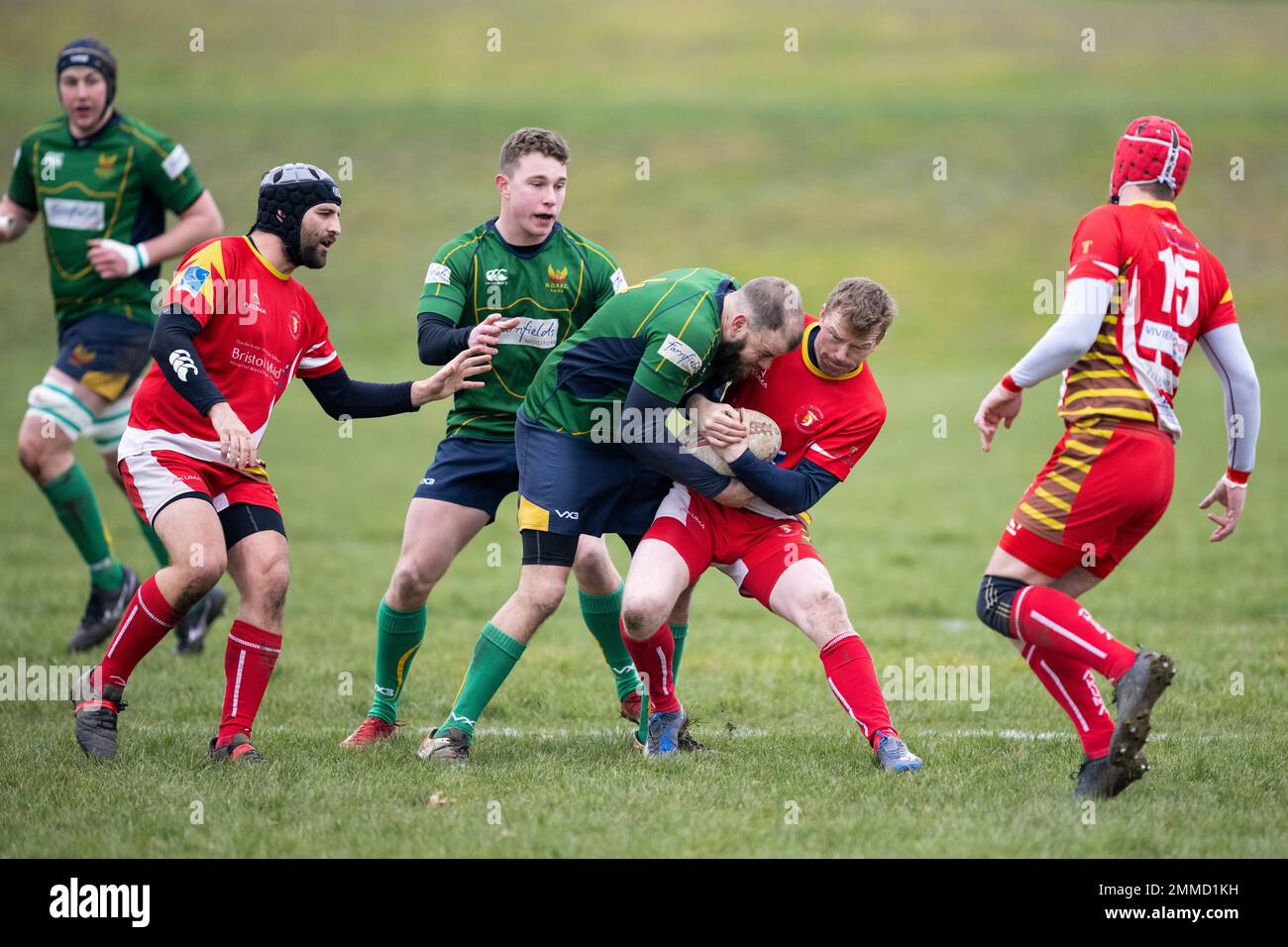 Rugby player being tackled Stock Photo - Alamy