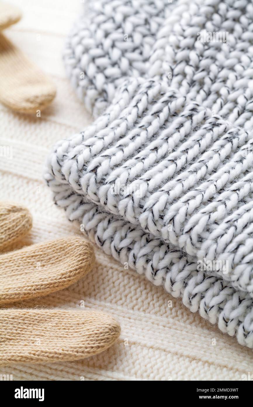 Wool sweaters and gloves for the cold winter, white-cream color Stock ...
