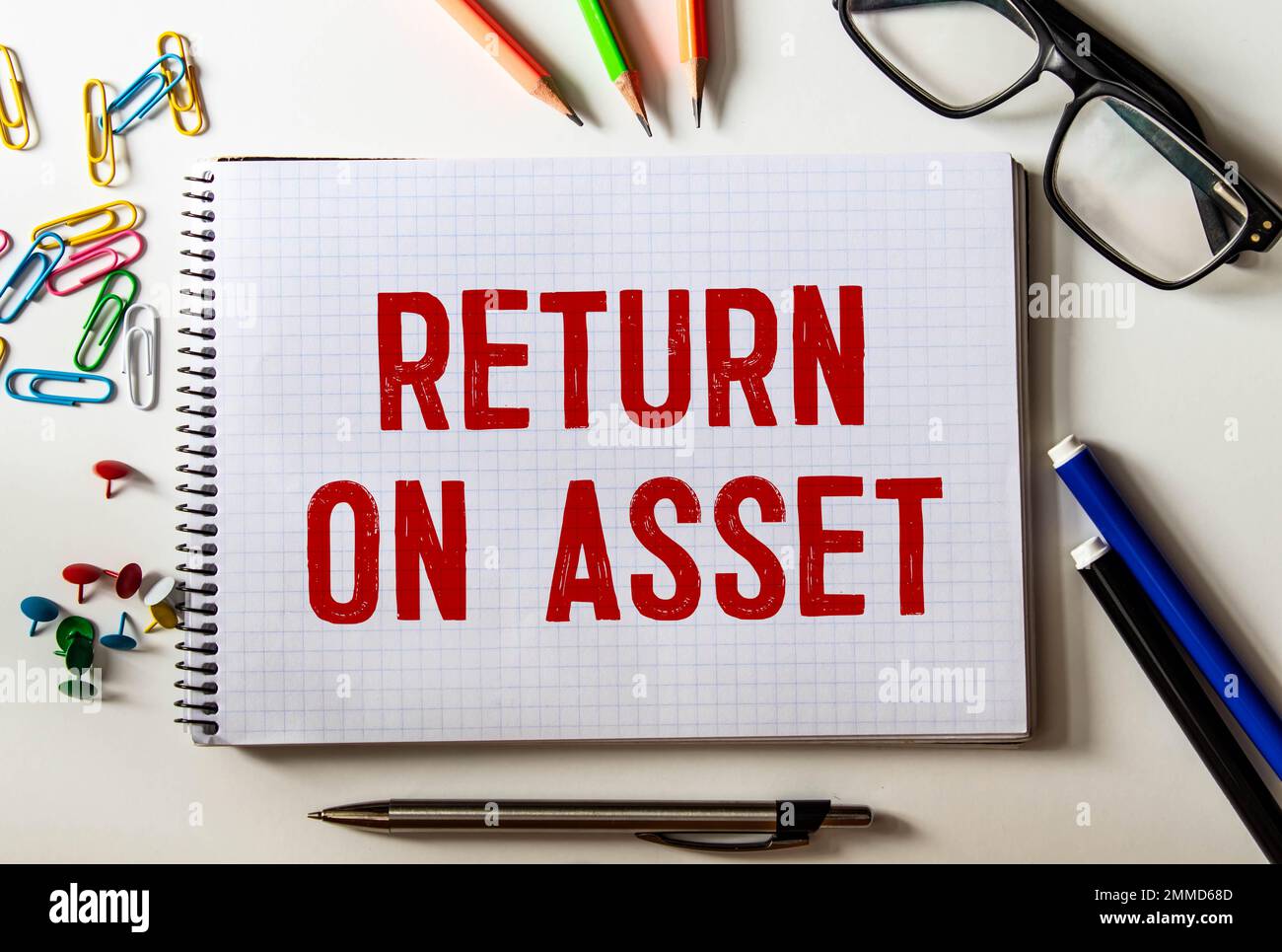 Home office workspace with keyboard, clipboard and pen with text RETURN ...