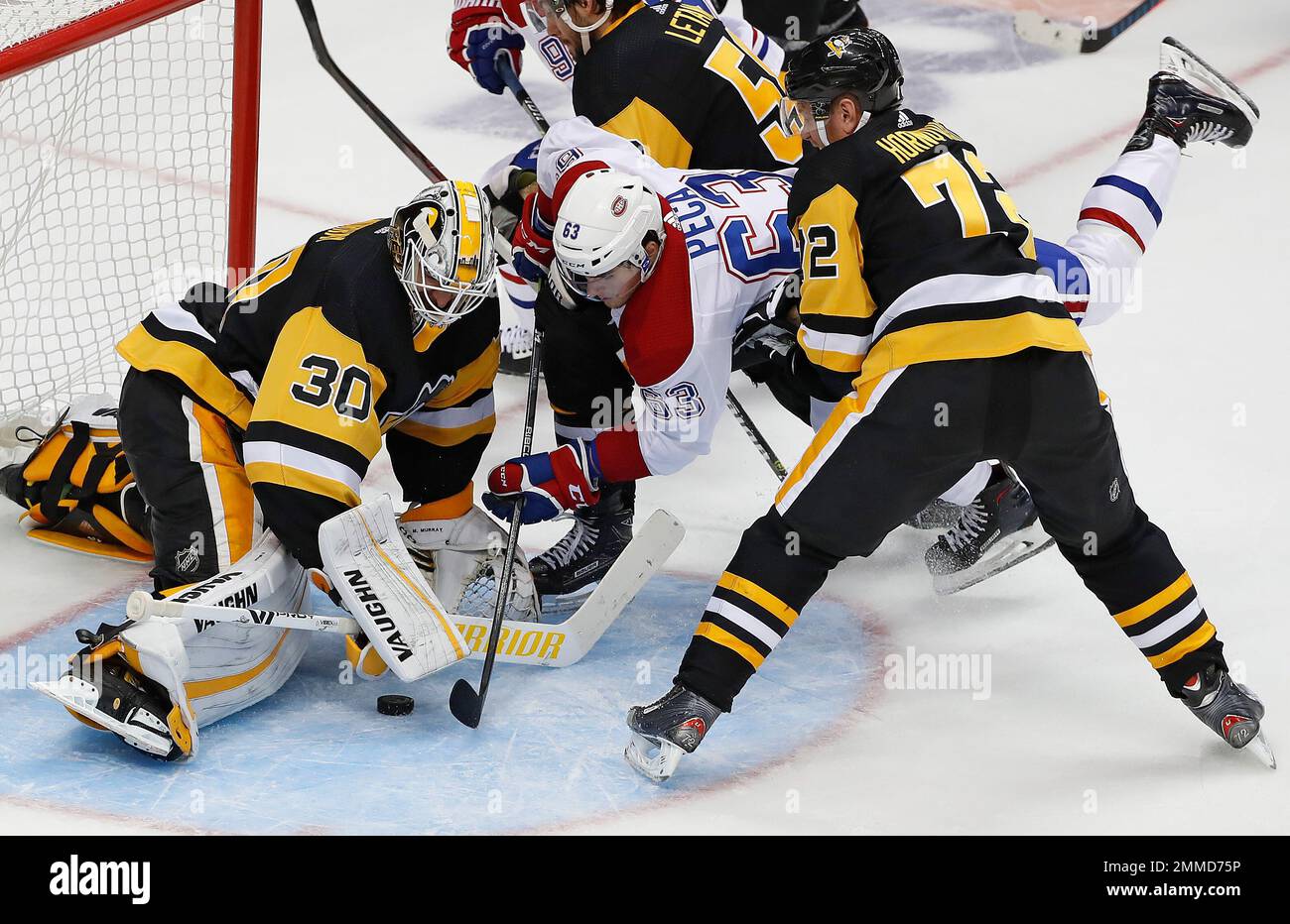 Montreal Canadiens' Matthew Peca (63) cannot get a shot past Pittsburgh ...