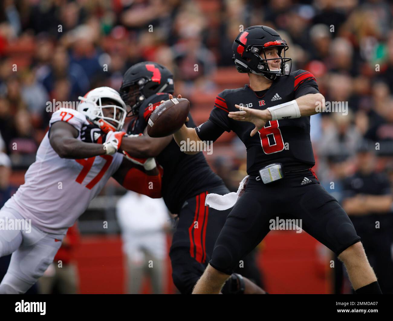 Rutgers quarterback Artur Sitkowski looks for a receiver as Illinois ...