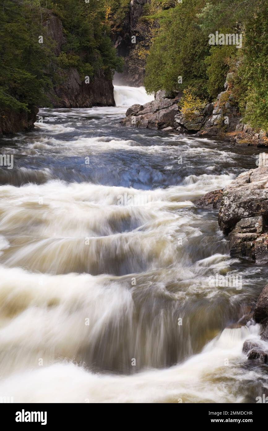 Ouareau river and white water rapids in autumn hi-res stock photography ...